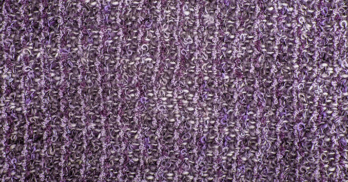 Was ist Bouclé für ein Stoff? Alles über Herkunft, Pflege und Eigenschaften